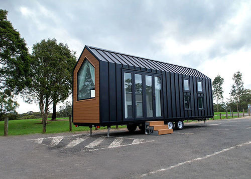 Introducing the White Queensland Tiny House on Wheels: The Perfect ...